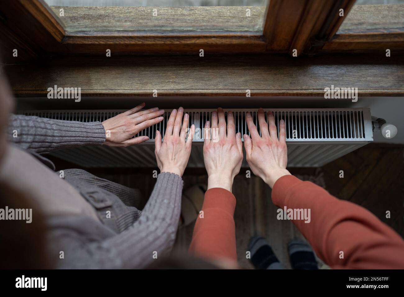 Cold family and electric heater hi-res stock photography and images - Alamy
