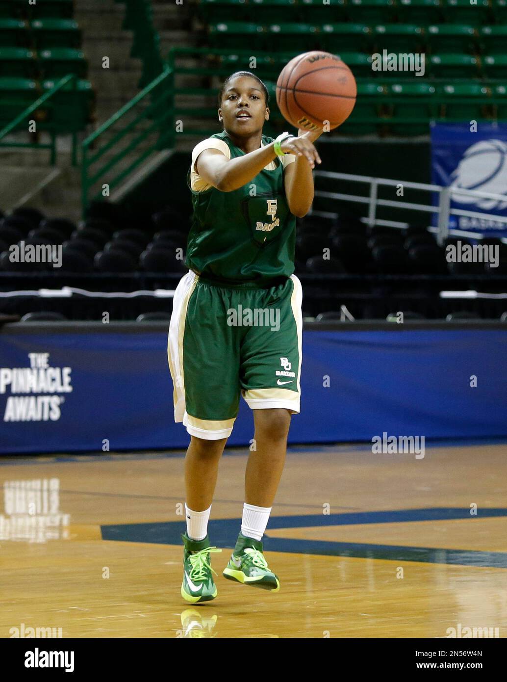 Baylor's Niya Johnson passes the ball during practice for the NCAA ...