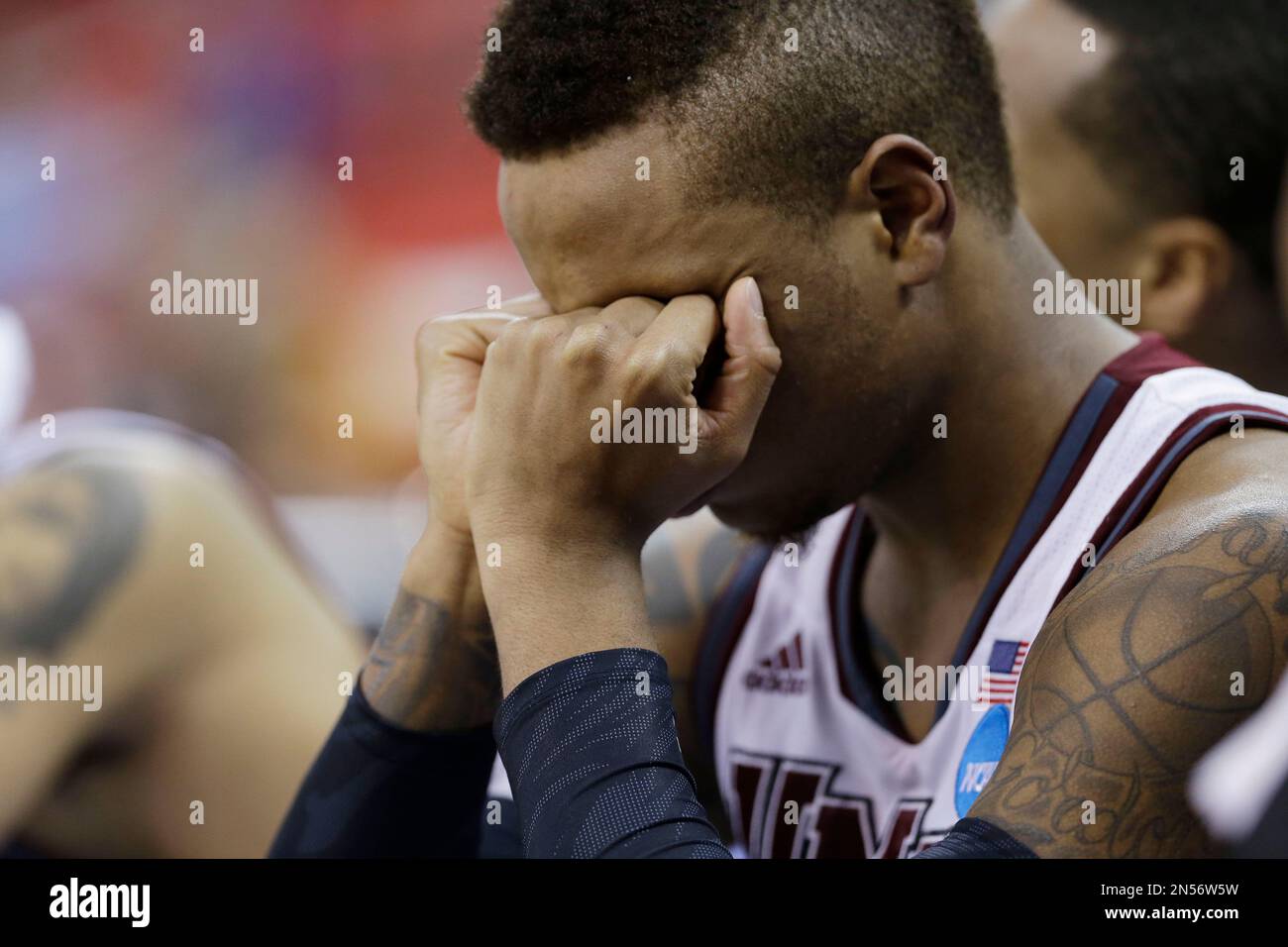 Massachusetts guard Derrick Gordon (2) sits on the bench after the ...