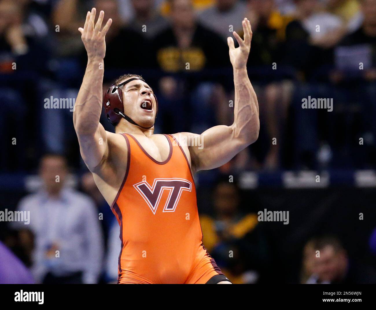 Virginia Tech's Chris Penny celebrates after defeating Iowa's Nathan ...