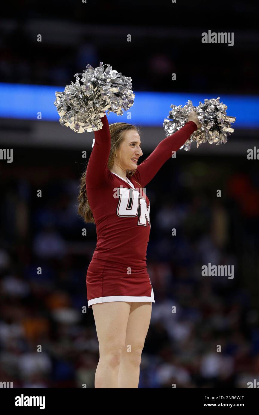 Massachusetts cheerleaders perfume against Tennessee during the first ...