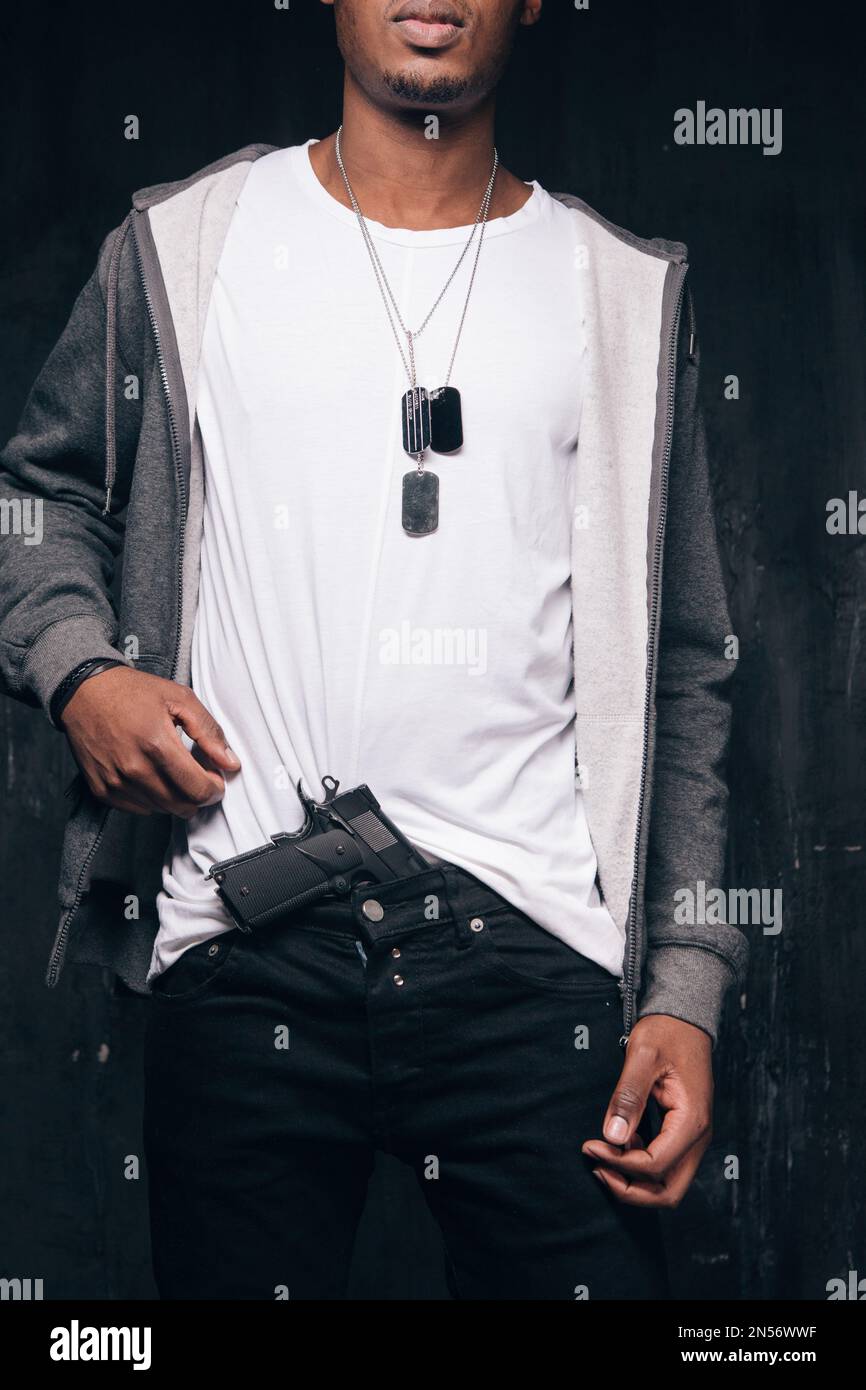 Black man with gun hi-res stock photography and images - Alamy