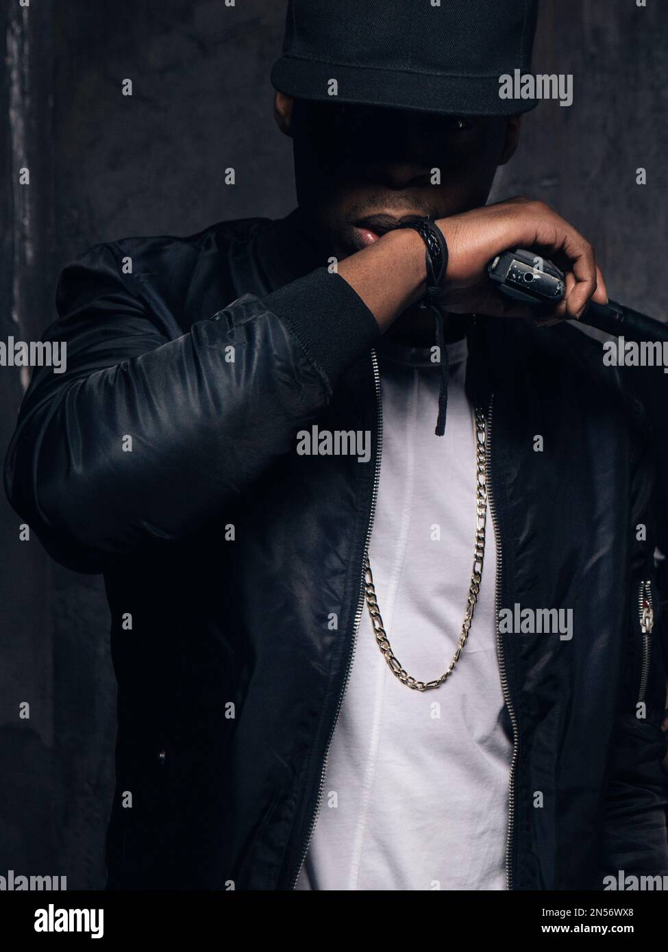 Unrecognizable armed black criminal man hi-res stock photography and ...