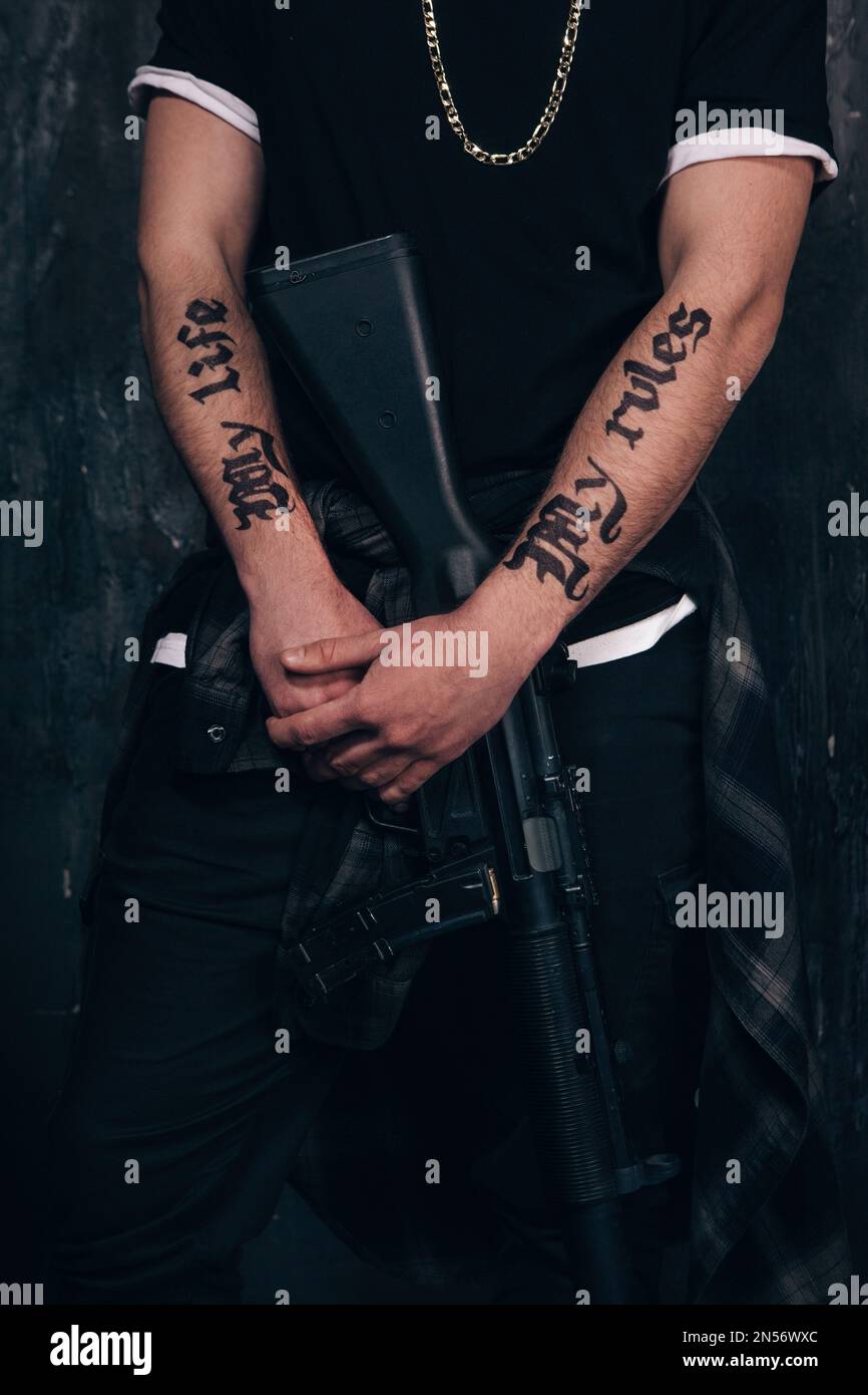 Unrecognizable criminal with sniper rifle Stock Photo - Alamy