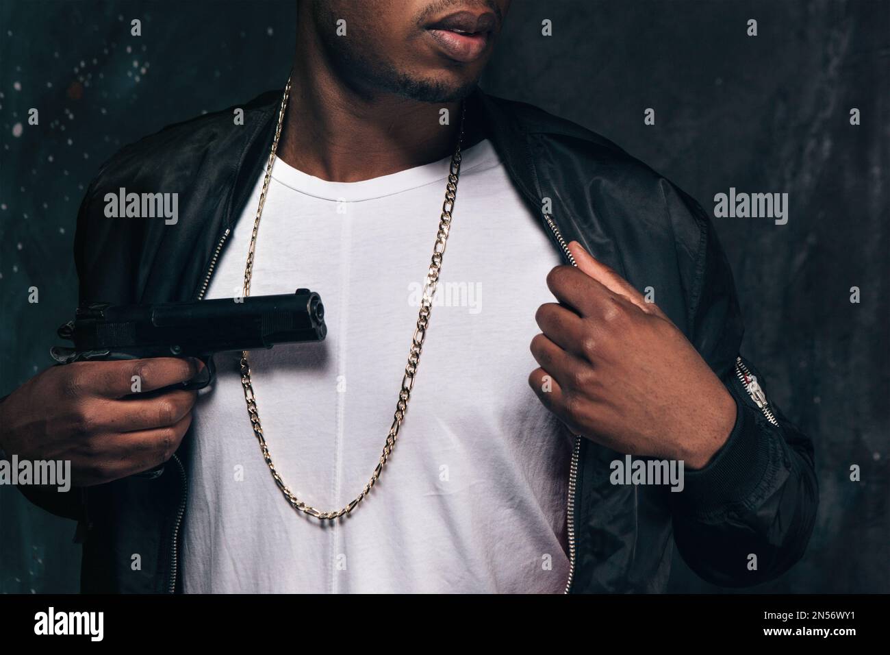 Unrecognizable armed black criminal man hi-res stock photography and ...