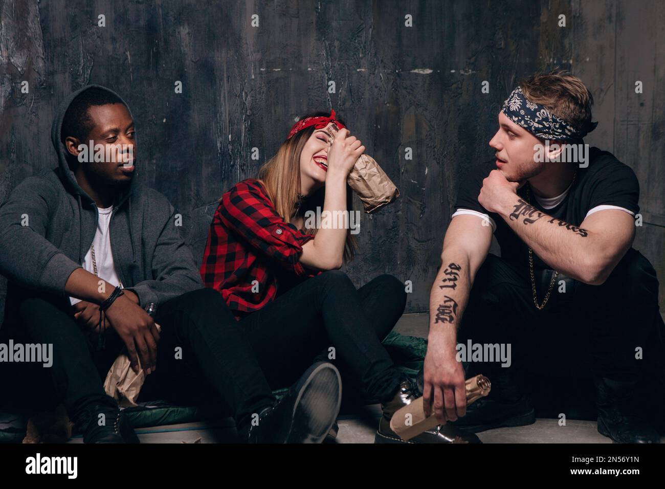 Group of alcoholic young people communicates Stock Photo - Alamy
