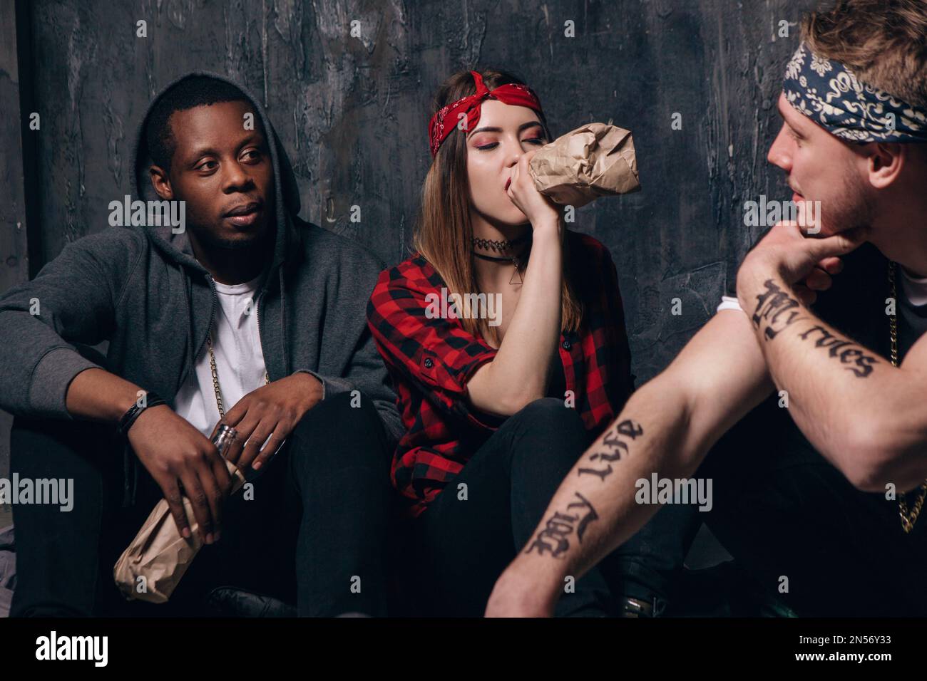 Group of alcoholic young people on night party Stock Photo - Alamy