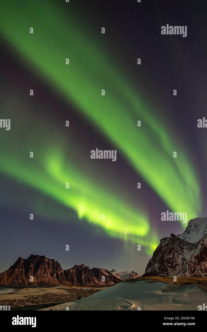 Northern lights (Aurora borealis) in winter Scandinavian landscape, sea ...