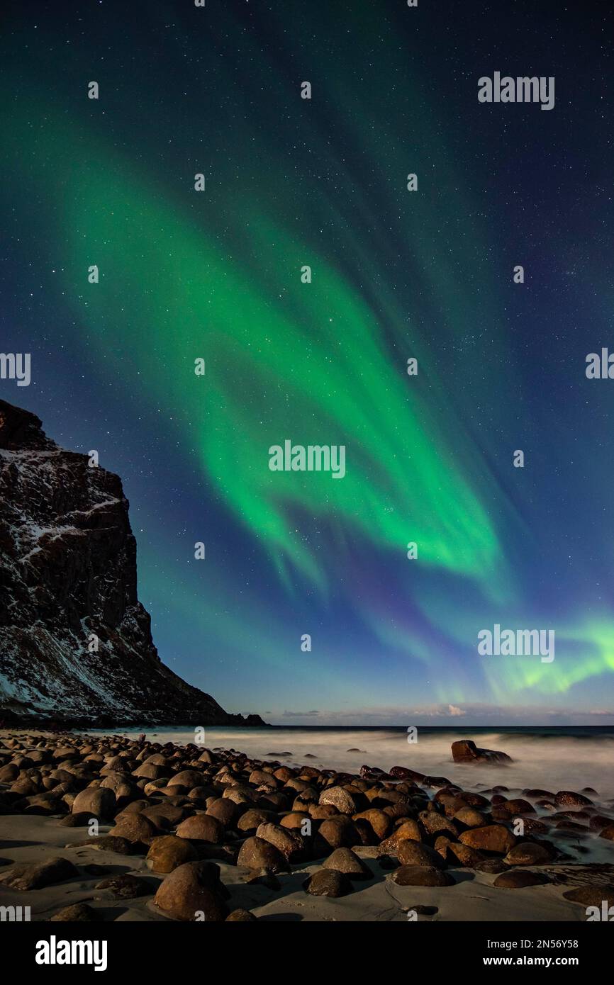 Northern lights (Aurora borealis) in winter Scandinavian landscape, sea ...