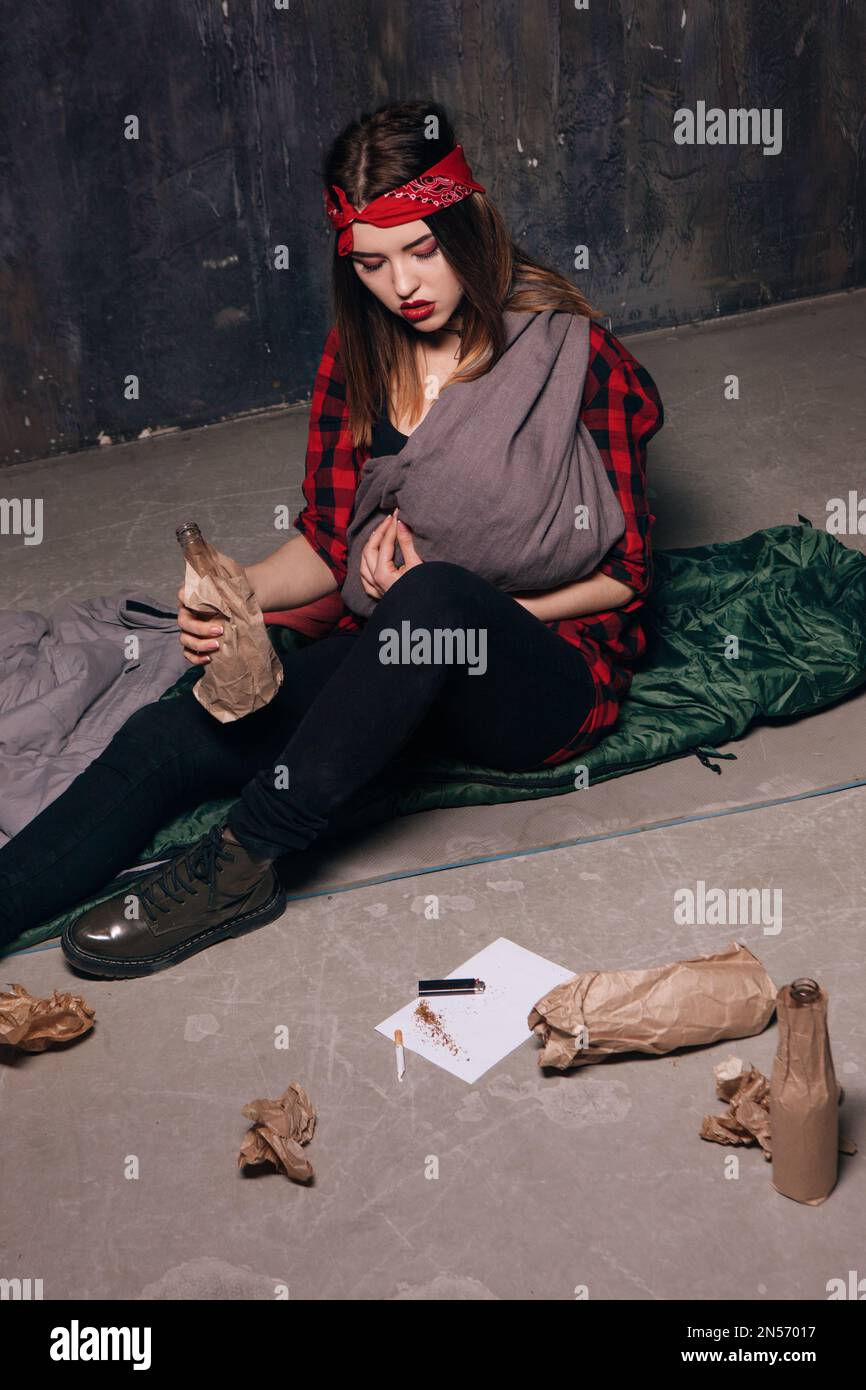 Poor alcoholic mother get drunk Stock Photo - Alamy