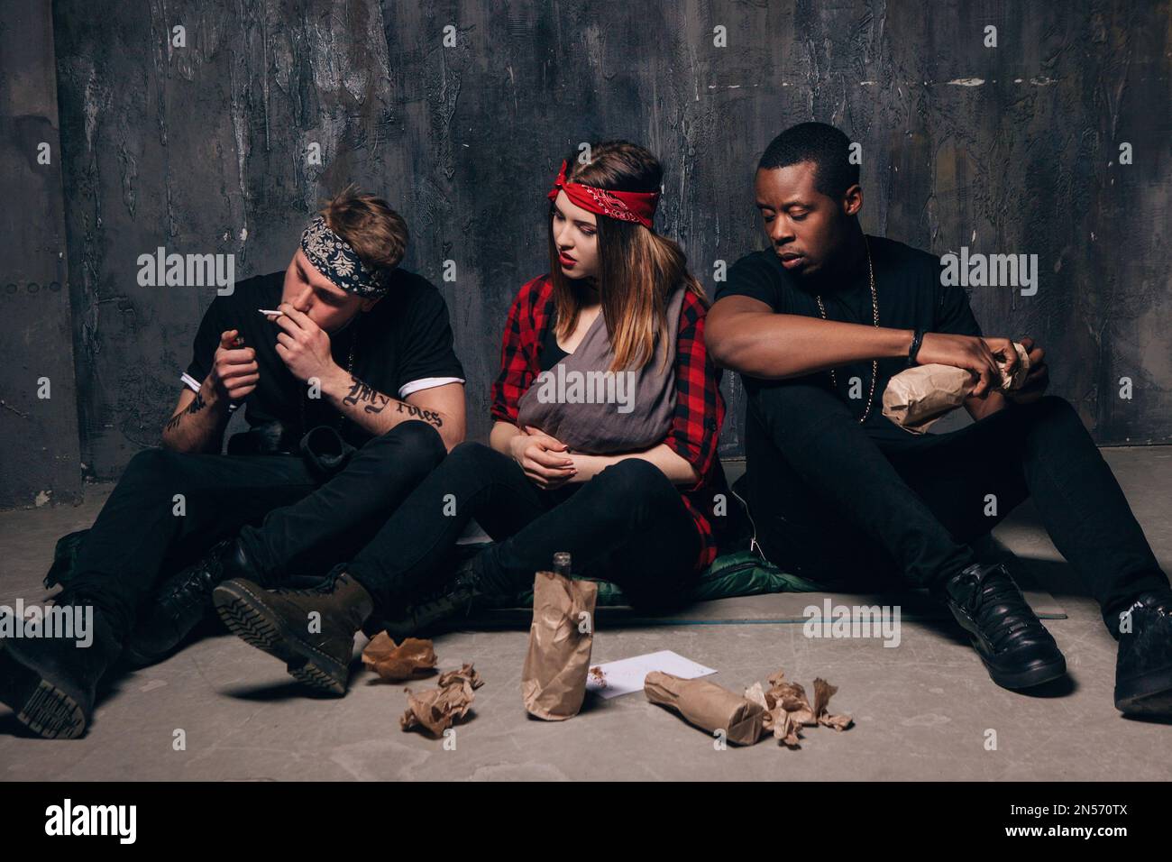Bad habits. People smokes and drink alcohol Stock Photo - Alamy
