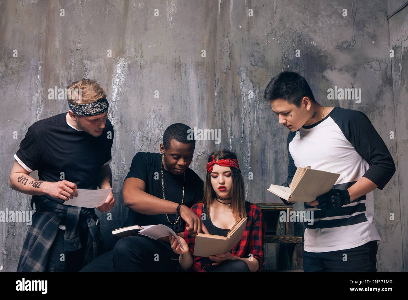 Students reading books together Stock Photo - Alamy