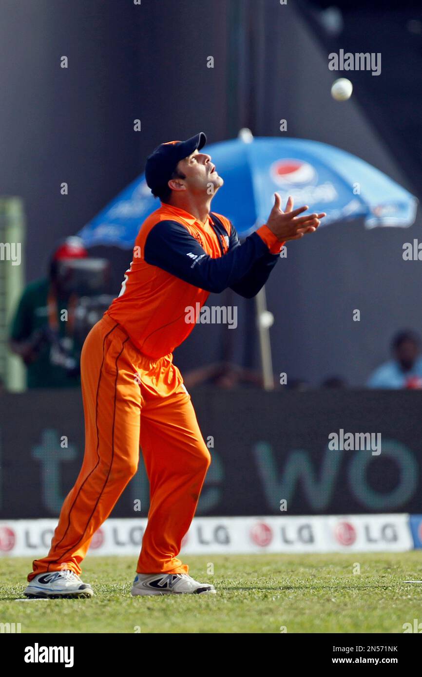 Netherlands' captain Peter Borren attempts to catch the ball ...