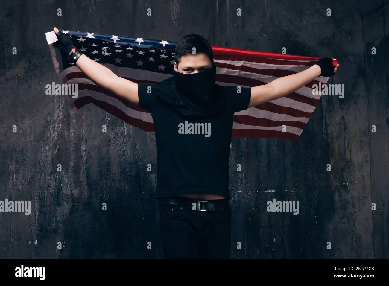 Flying USA flag and unrecognizable gangster Stock Photo - Alamy