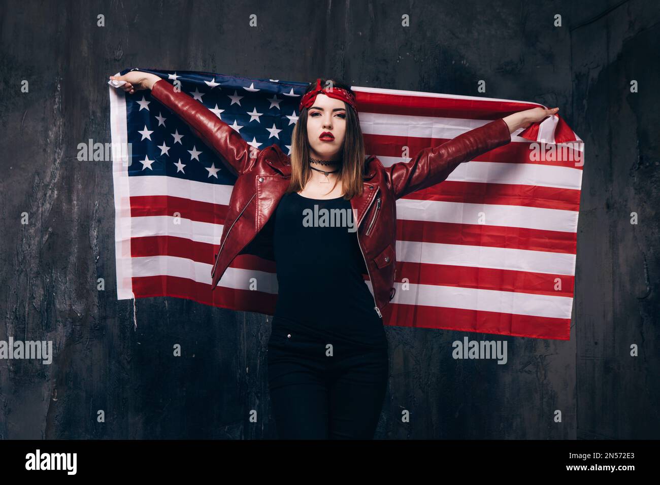 Girl with USA flag behind the back Stock Photo - Alamy