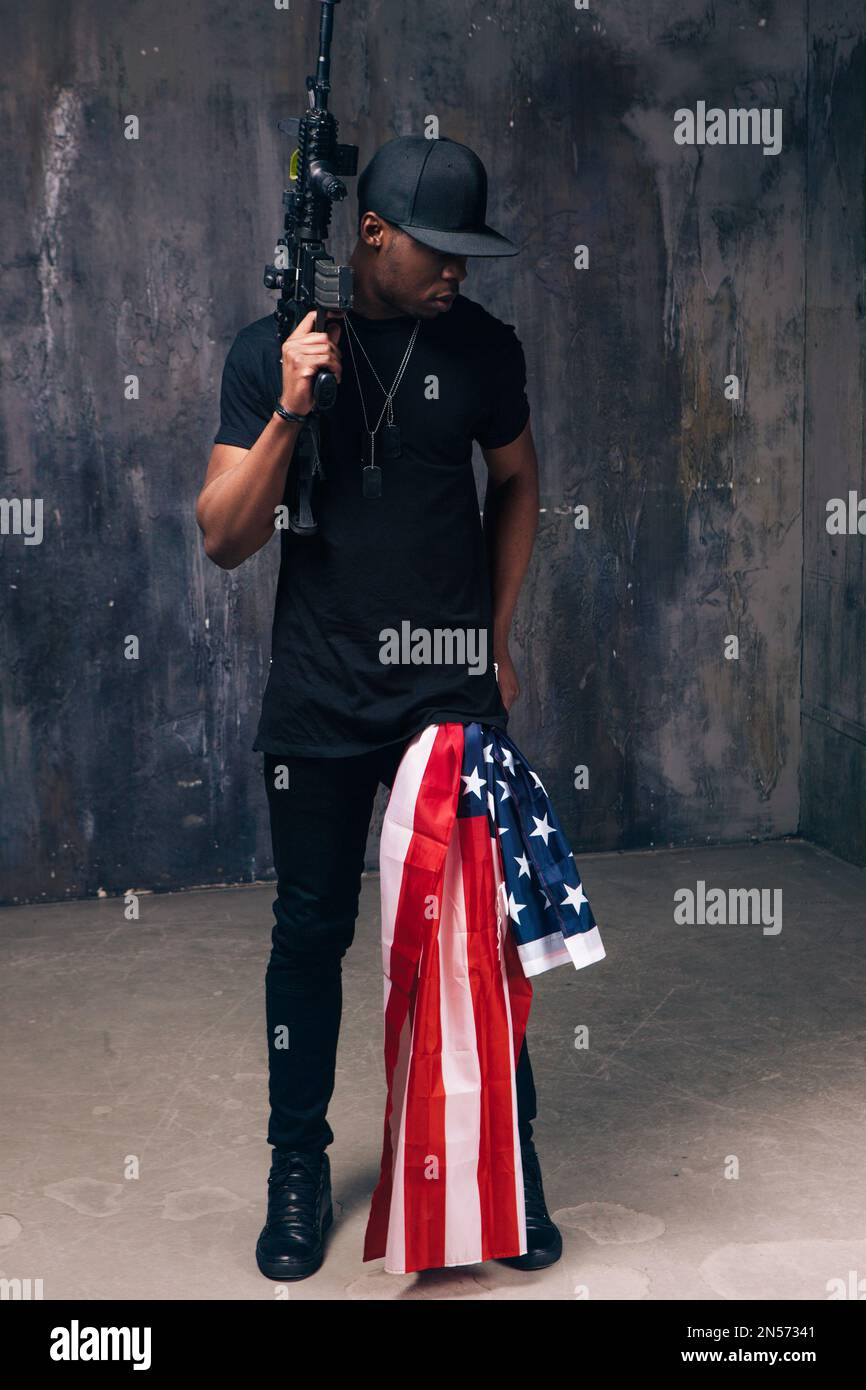 American man flag gun hi-res stock photography and images - Alamy