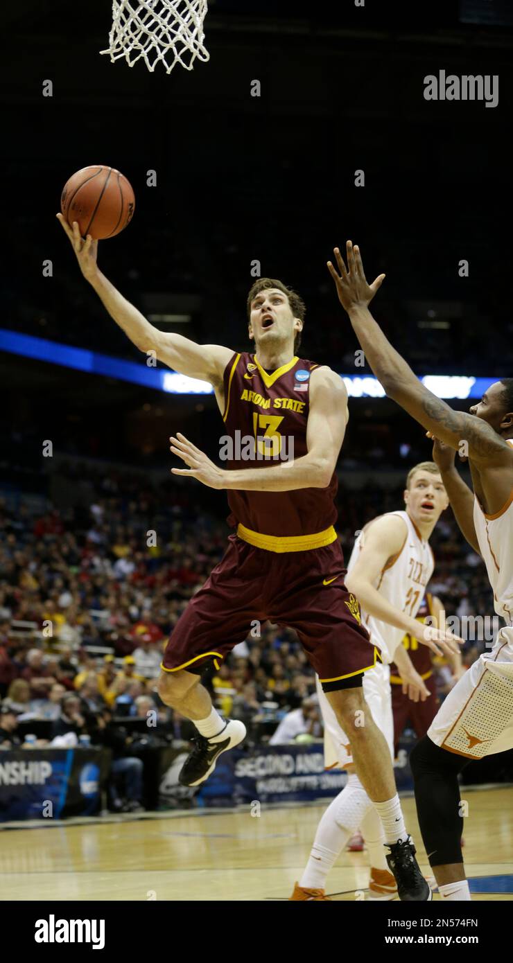 Arizona State center Jordan Bachynski (13) drives to the basket during ...