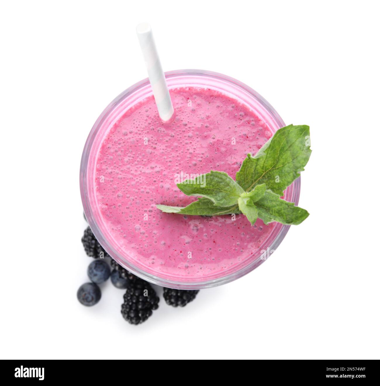 Tasty fresh milk shake with berries on white background, top view Stock ...