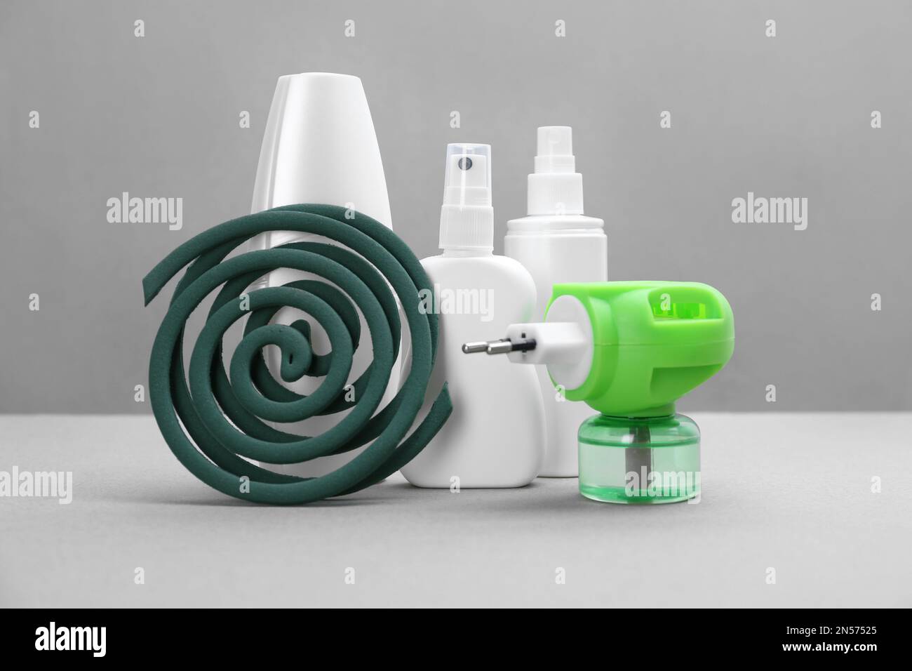 Set of different insect repellents on grey background Stock Photo - Alamy