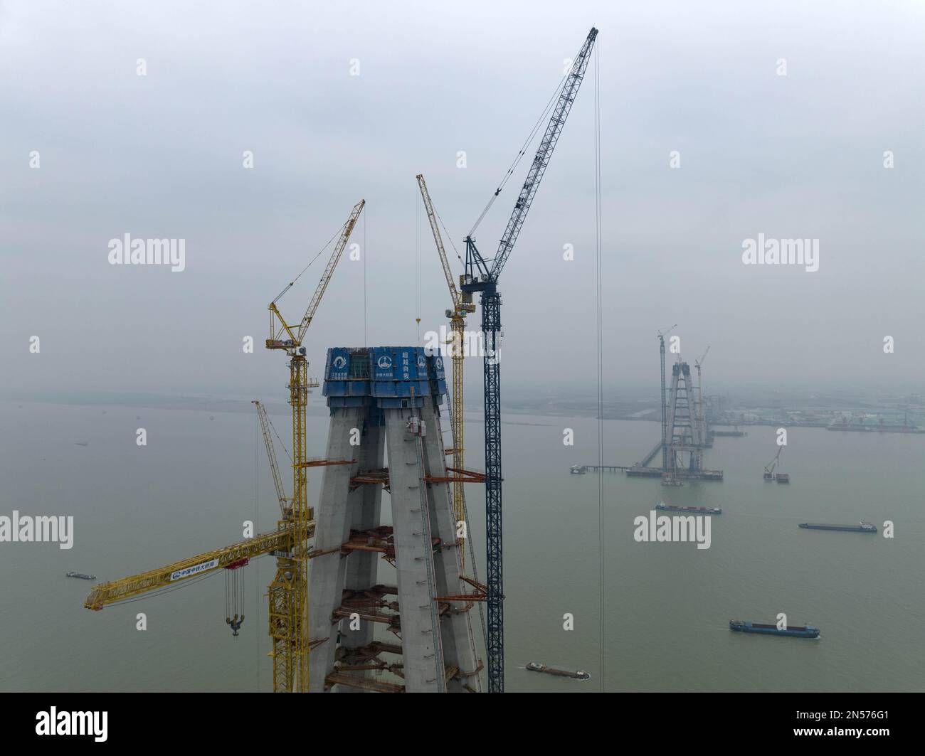 Aerial photo shows Changtai Yangtze River Bridge is under construction ...