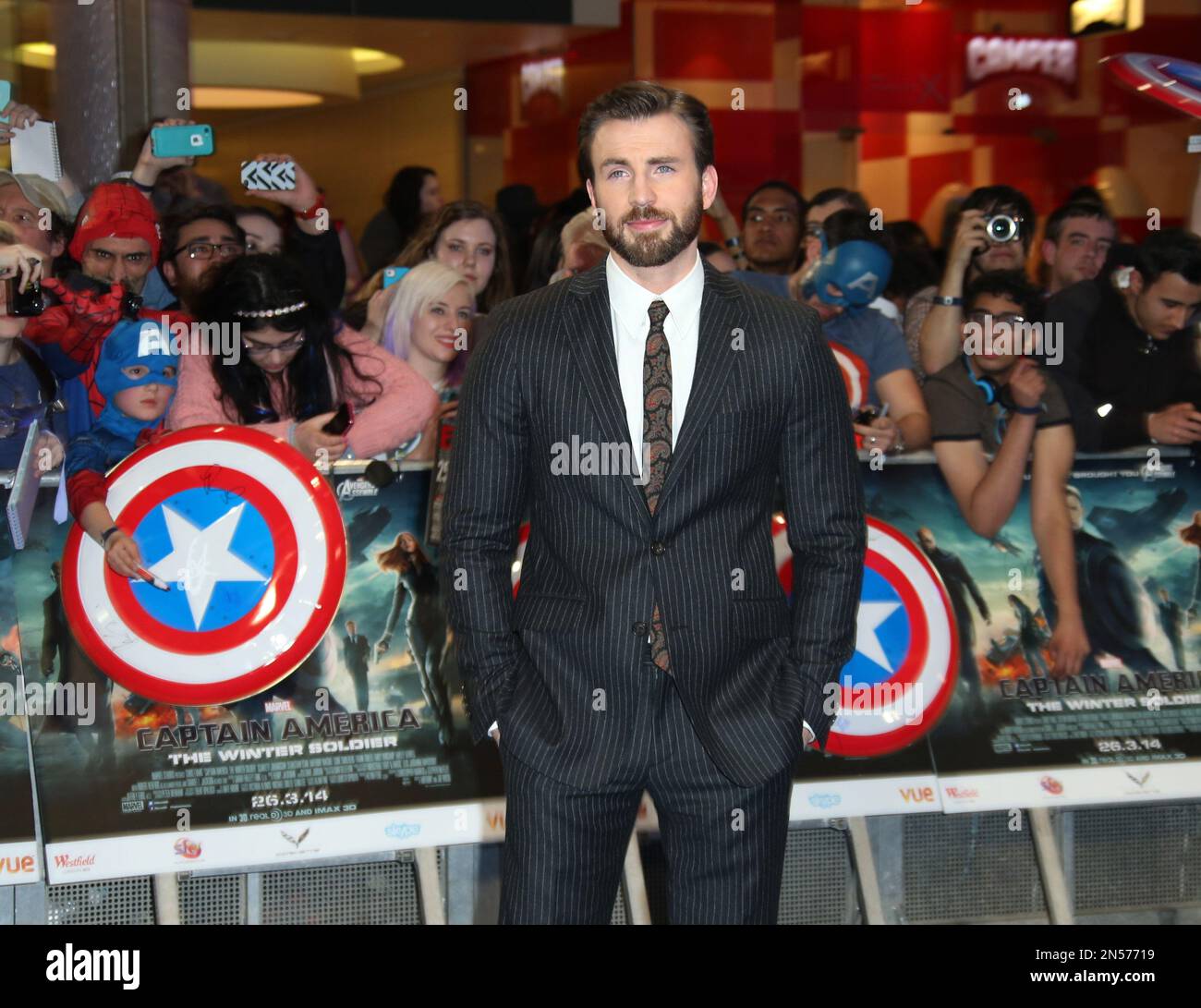 U.S. actor Chris Evans poses for photographers as he arrives for the UK ...