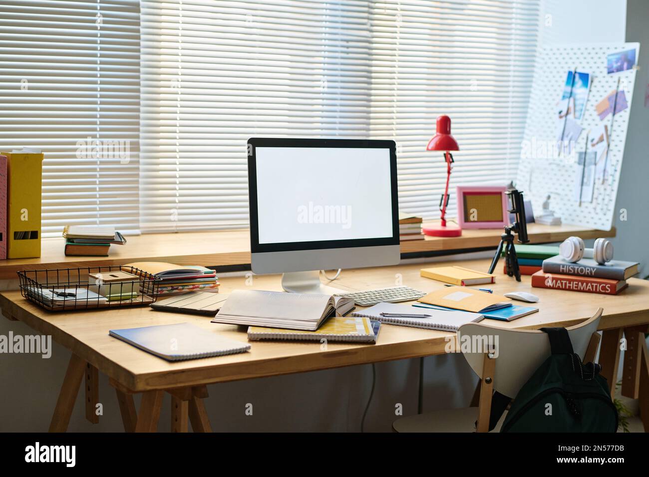 Workplace with computer monitor on table for online study in the teen ...