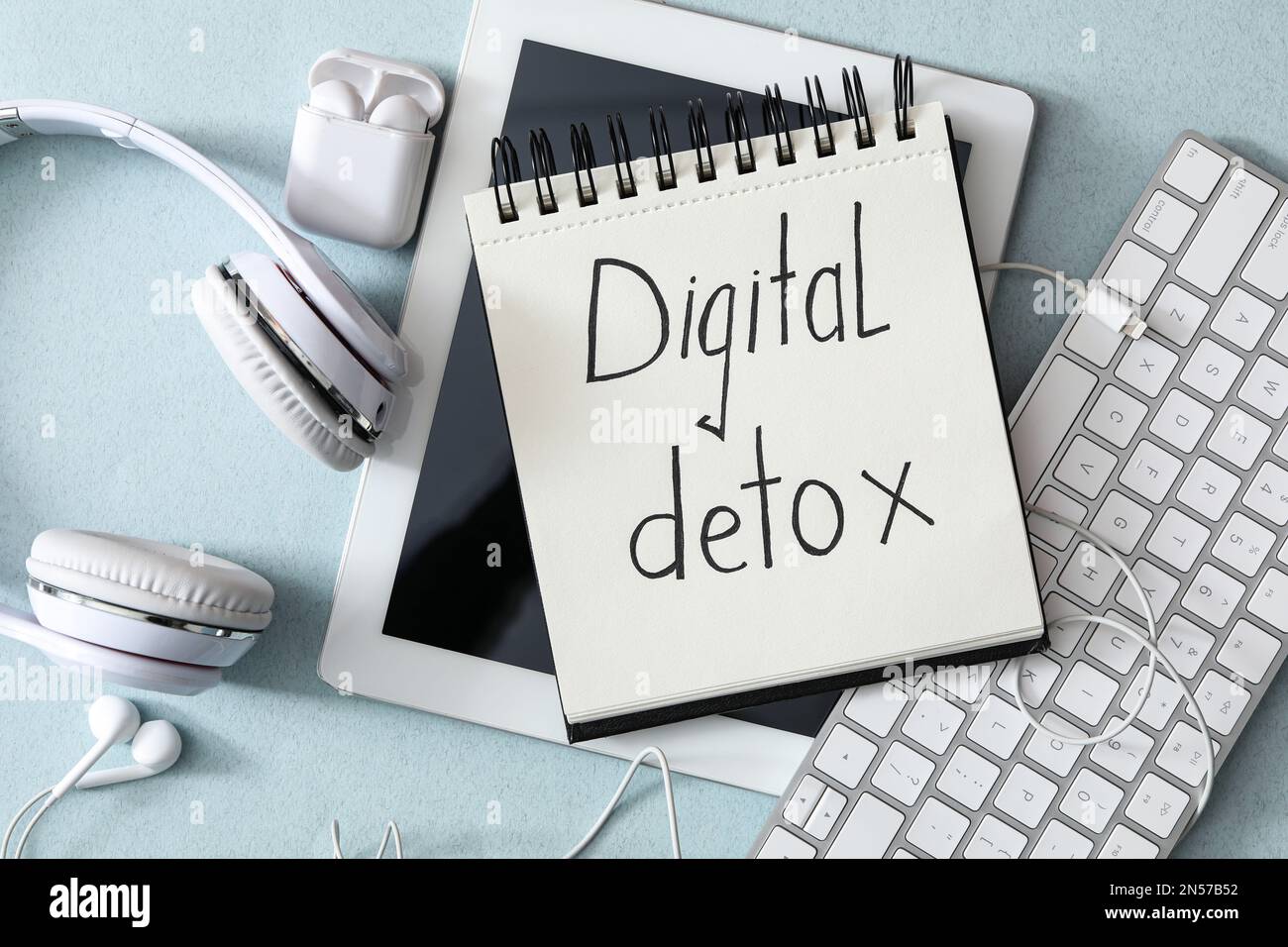 Flat lay composition of notebook with words DIGITAL DETOX and different ...