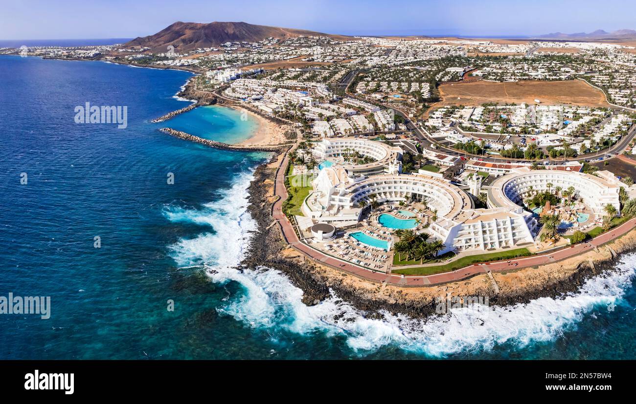 Lanzarote island, Playa Blanca resort. aerial drone panoramic view ...
