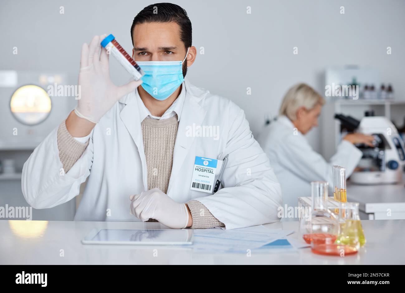 Science, mask and man with blood, laboratory and experiment for cure ...