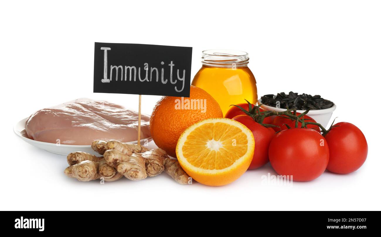 Set of natural products and card with word Immunity on white background ...