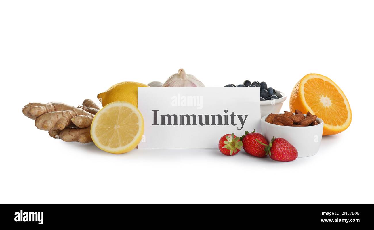 Set of natural products and paper with word Immunity on white ...