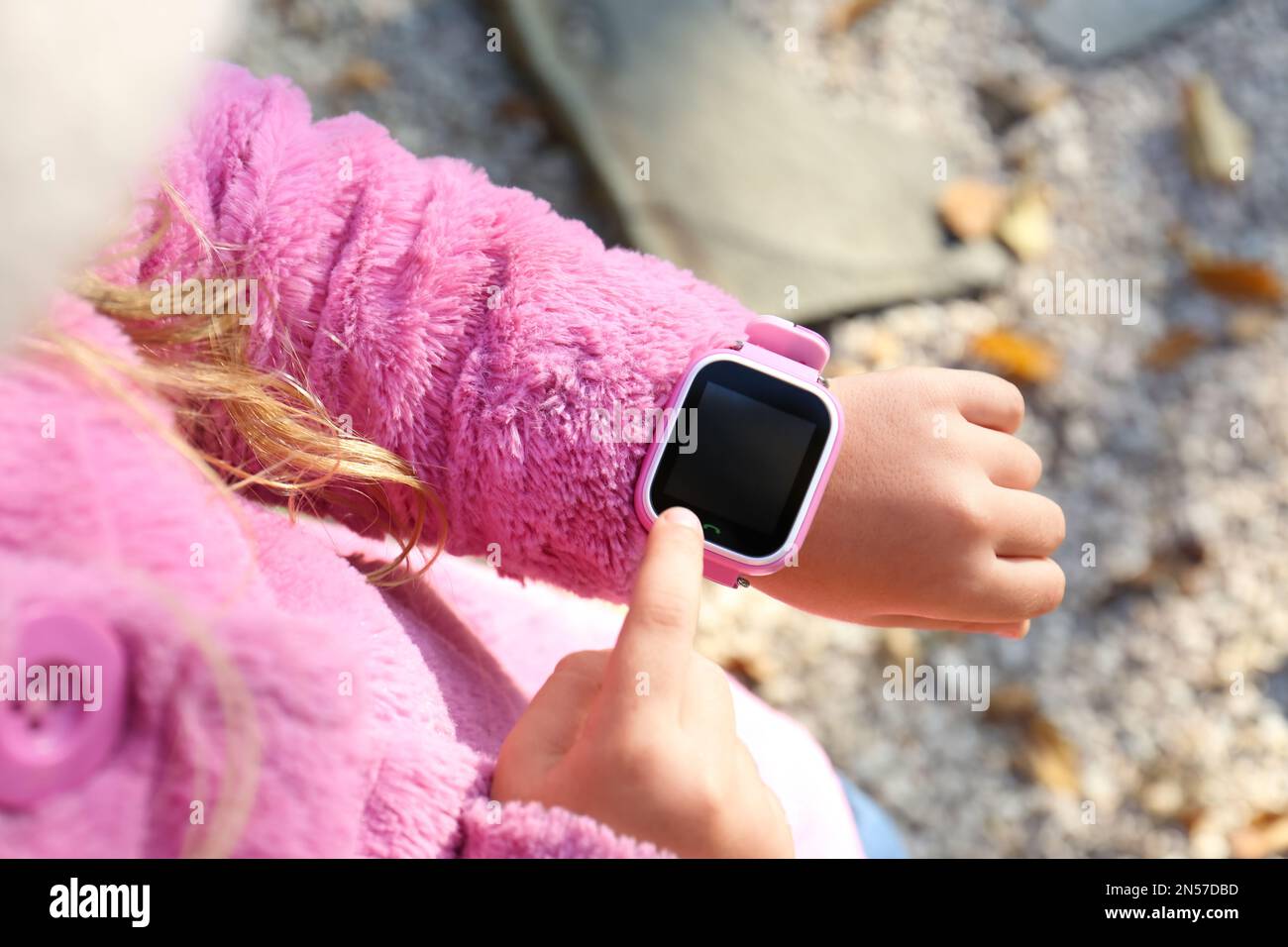 Little girl time wrist watch hi-res stock photography and images - Alamy
