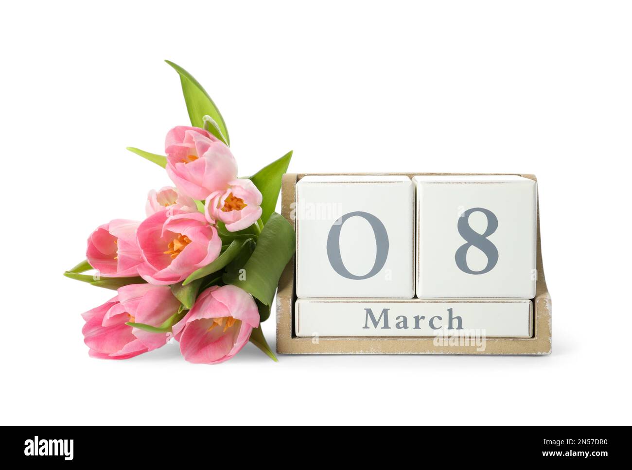 Wooden block calendar with date 8th of March and tulips on white ...