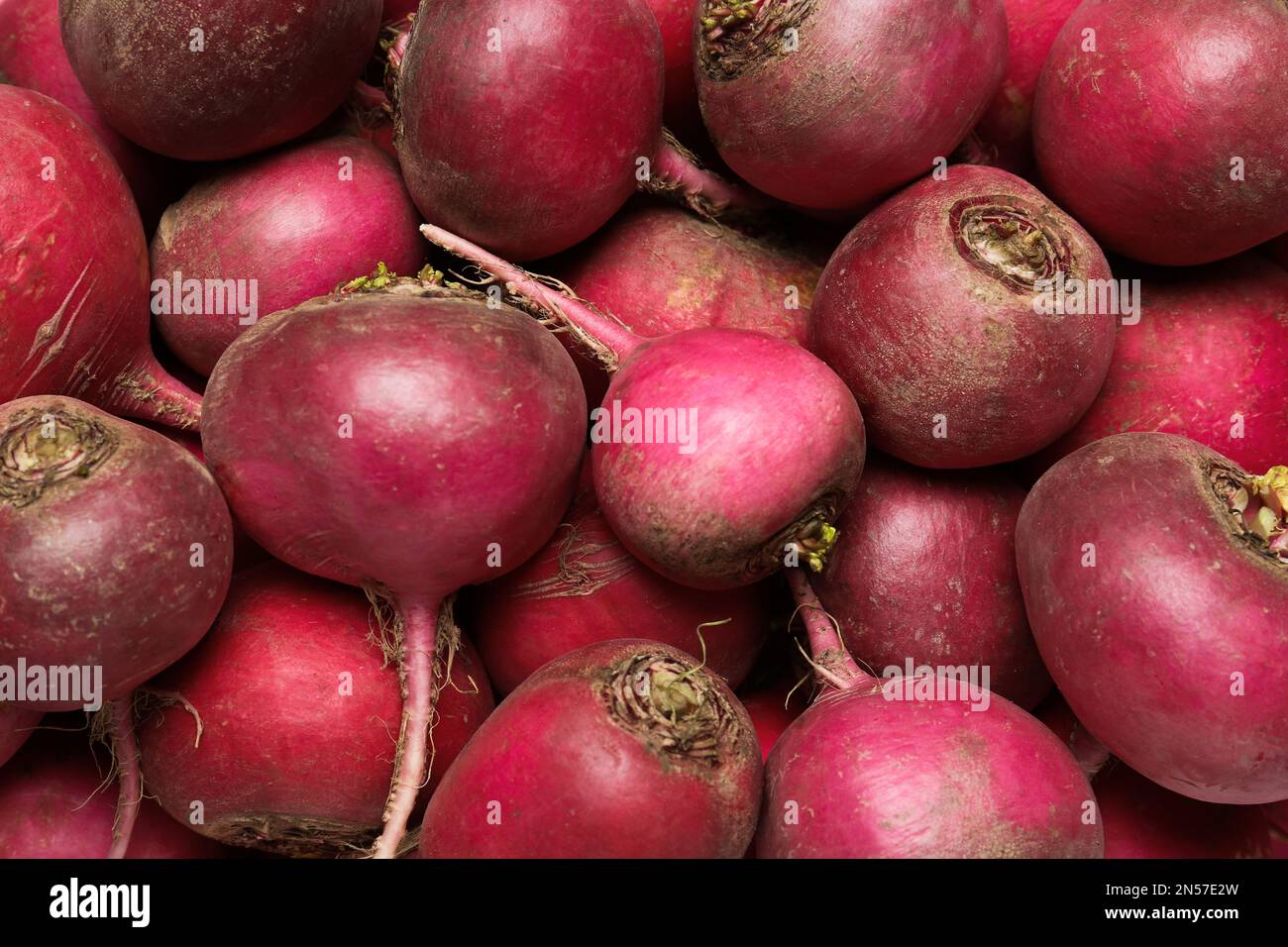 Pile of red turnips as background, top view Stock Photo - Alamy