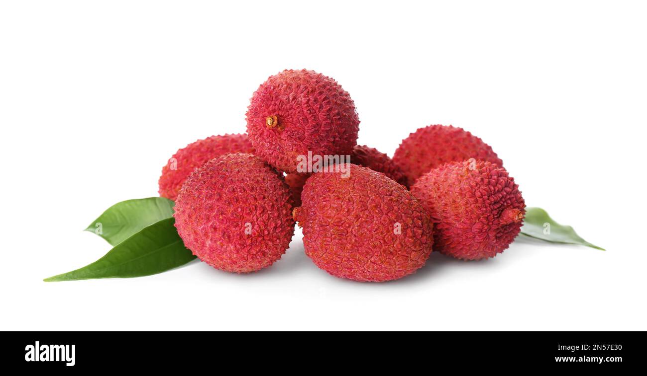 Pile of fresh ripe lychees with green leaves on white background Stock ...
