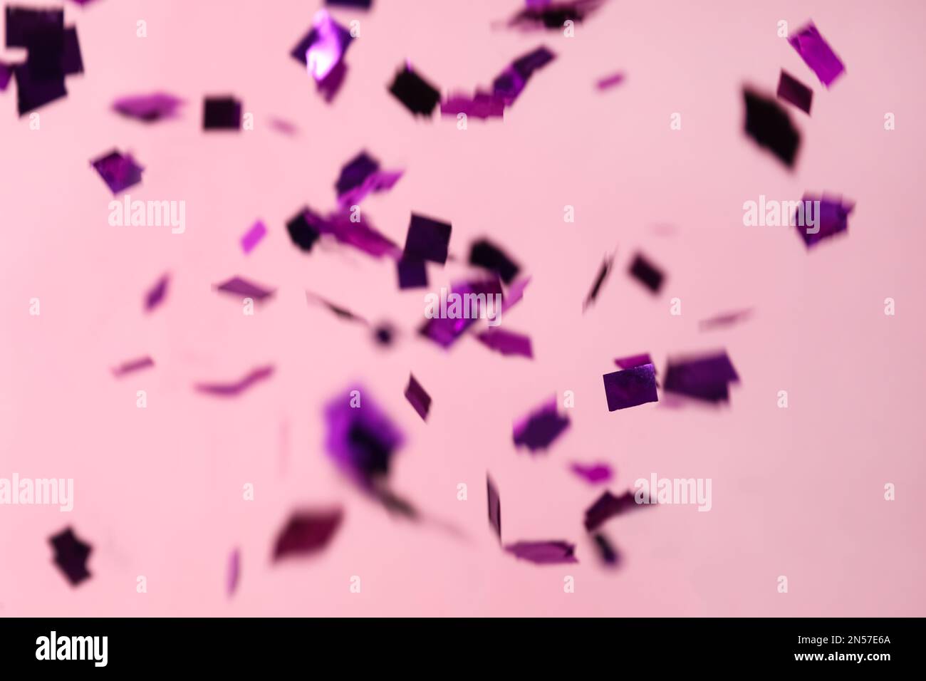 Falling shiny purple foil confetti hi-res stock photography and images ...