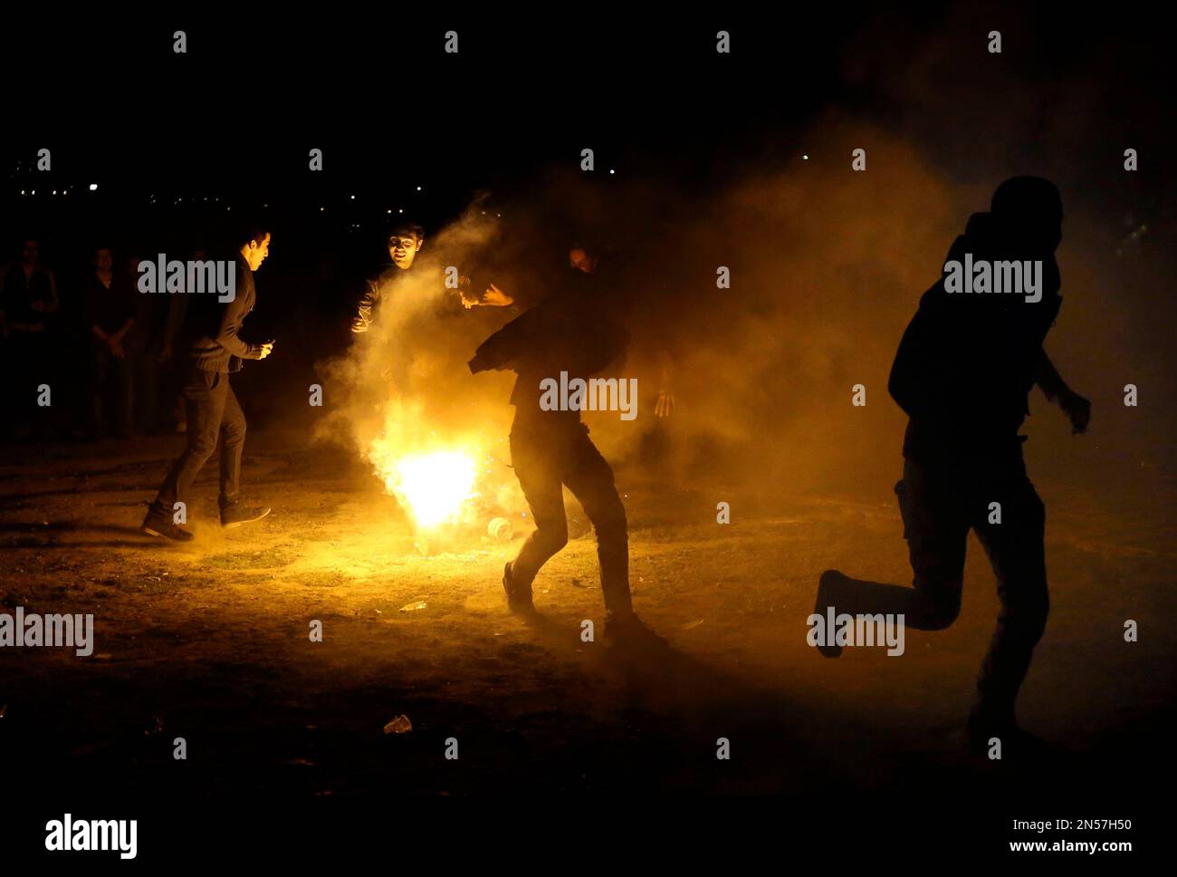 In this picture taken on Tuesday, March 18, 2014, Iranian young adults ...