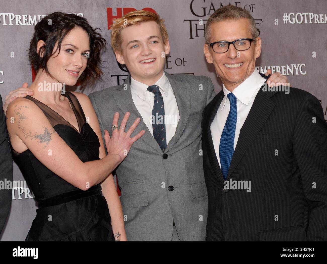 Actors Lena Headley, left, and Jack Gleeson pose with Michael Lombardo ...