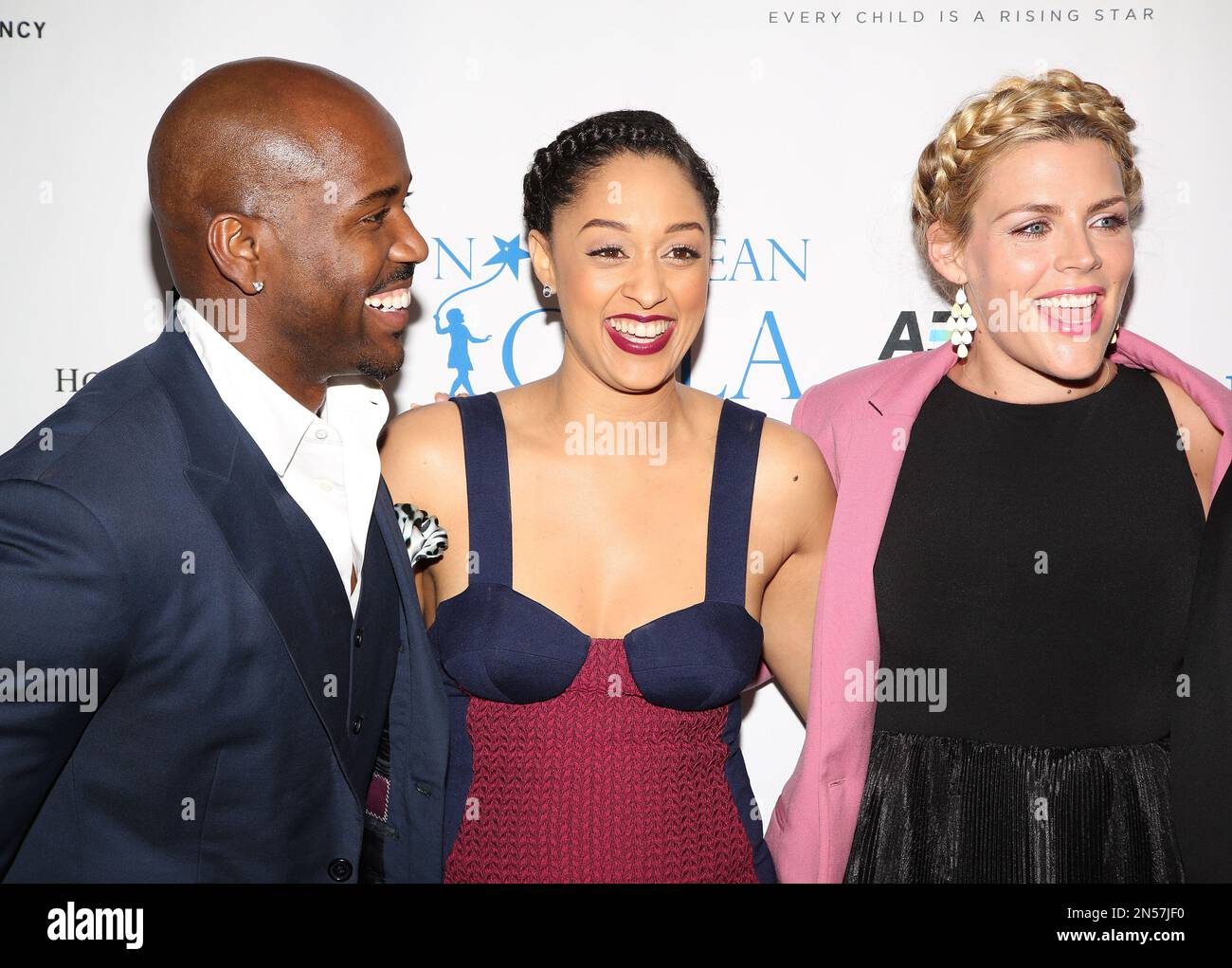 From left, Dolvett Quince, Tia Mowry, and Busy Philipps attend The ...