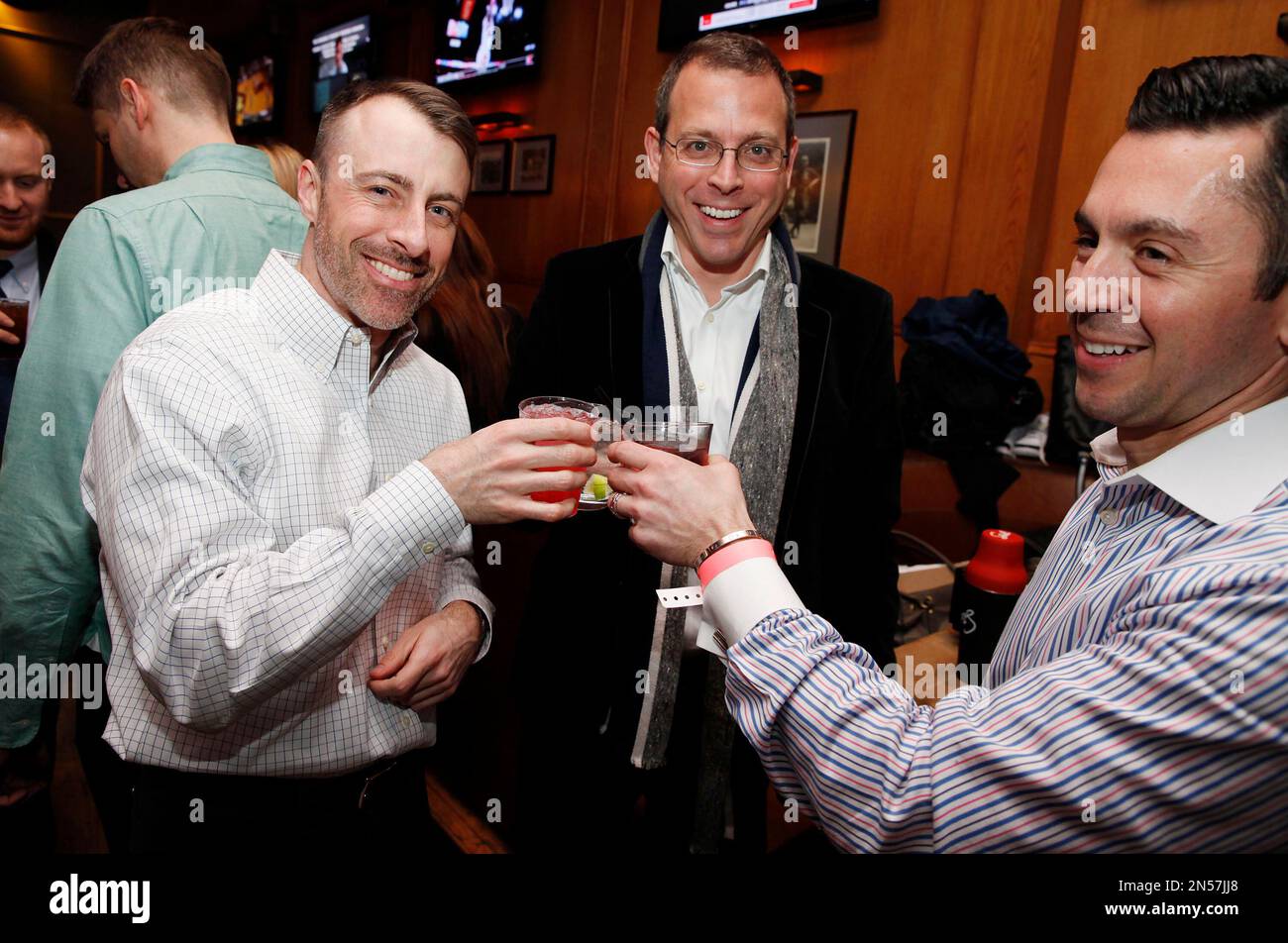 Guests enjoy Stoli® drinks while waiting for Manhattan bartender ...