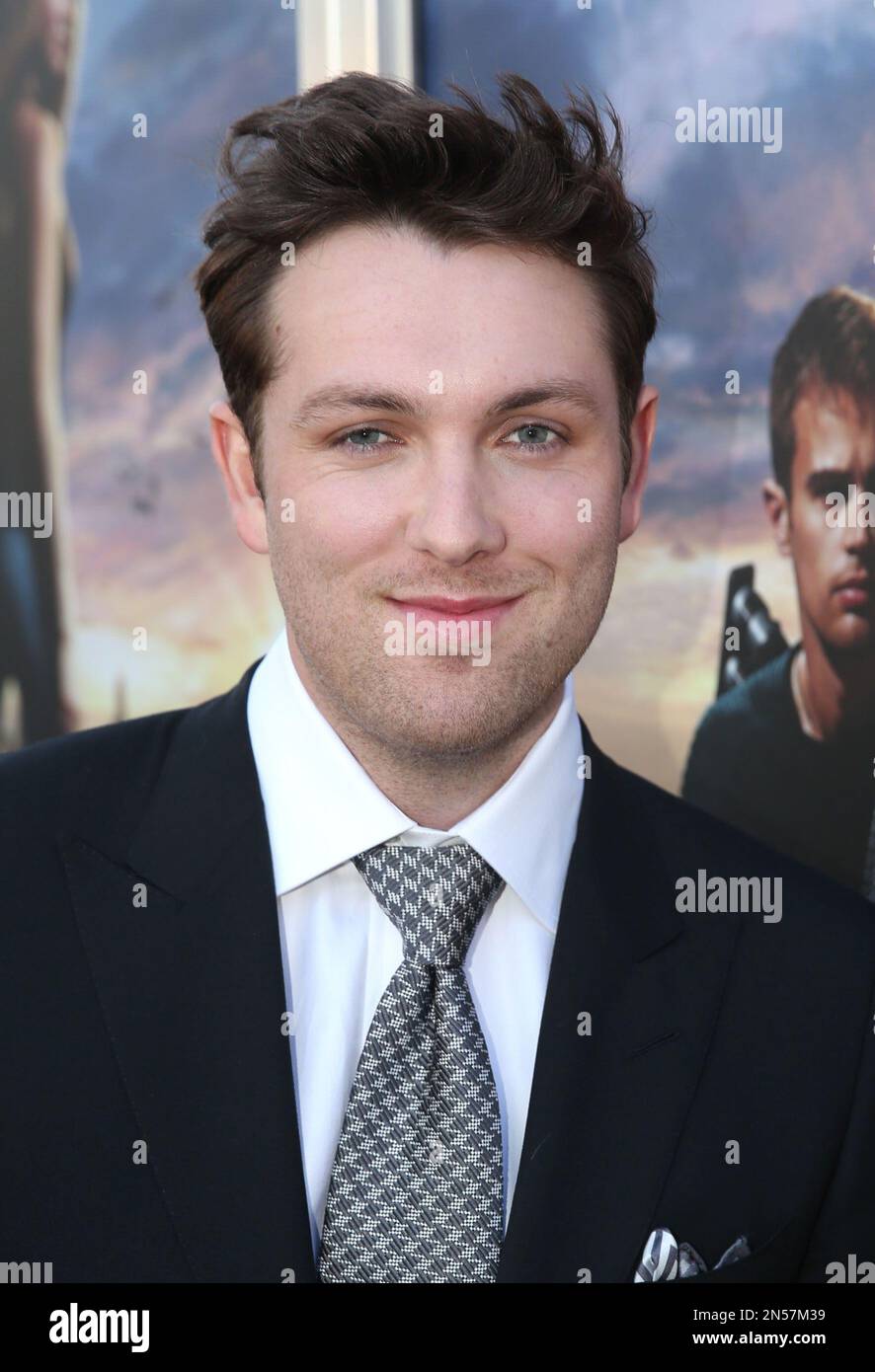 Christian Madsen arrives at the world premiere of "Divergent" at the ...