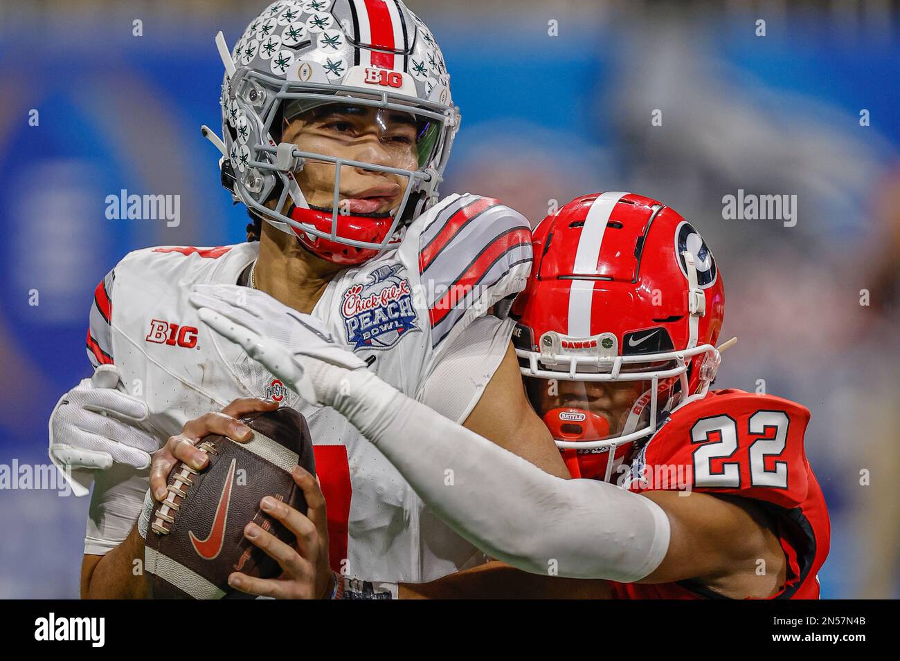 December 31, 2022: Ohio State's CJ Stroud (7) is hit and taken down for ...