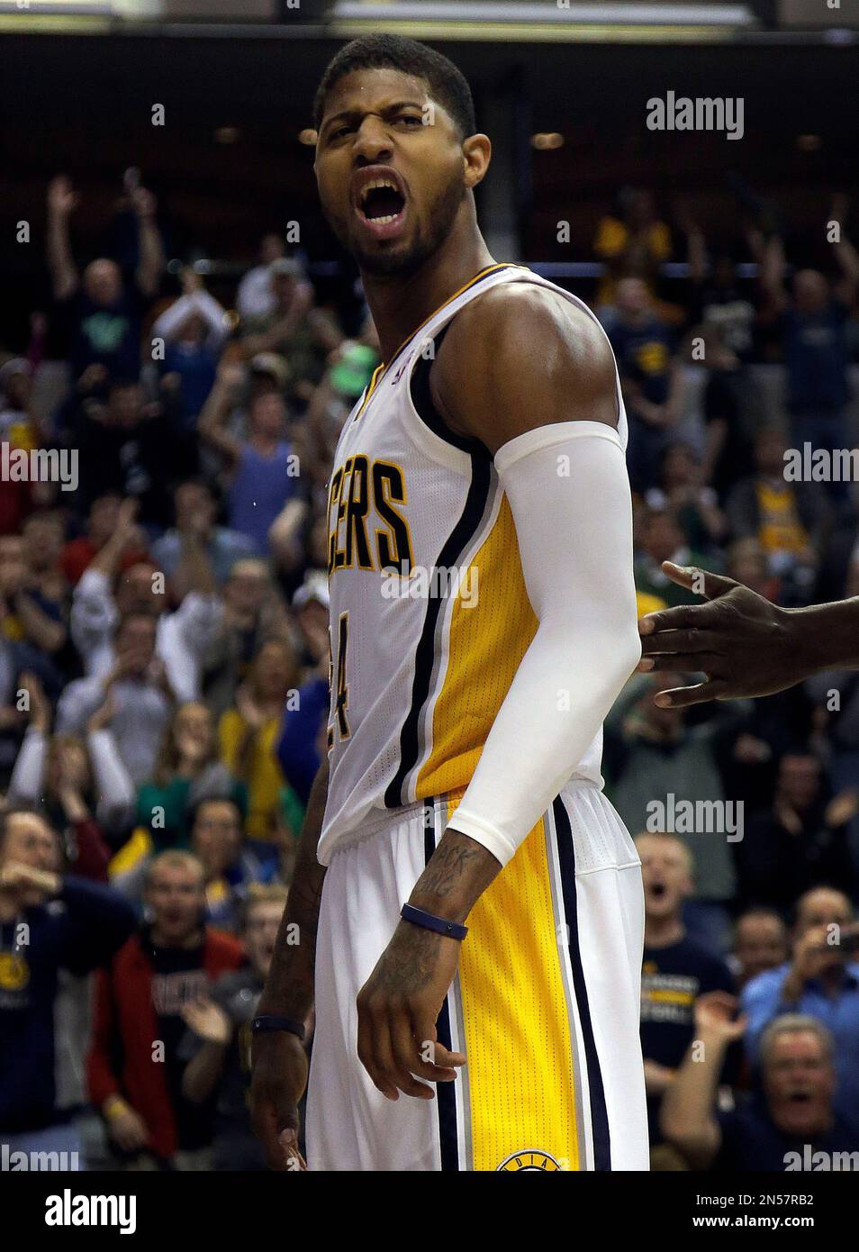 Indiana Pacers forward Paul George (24) reacts after scoring on a dunk ...