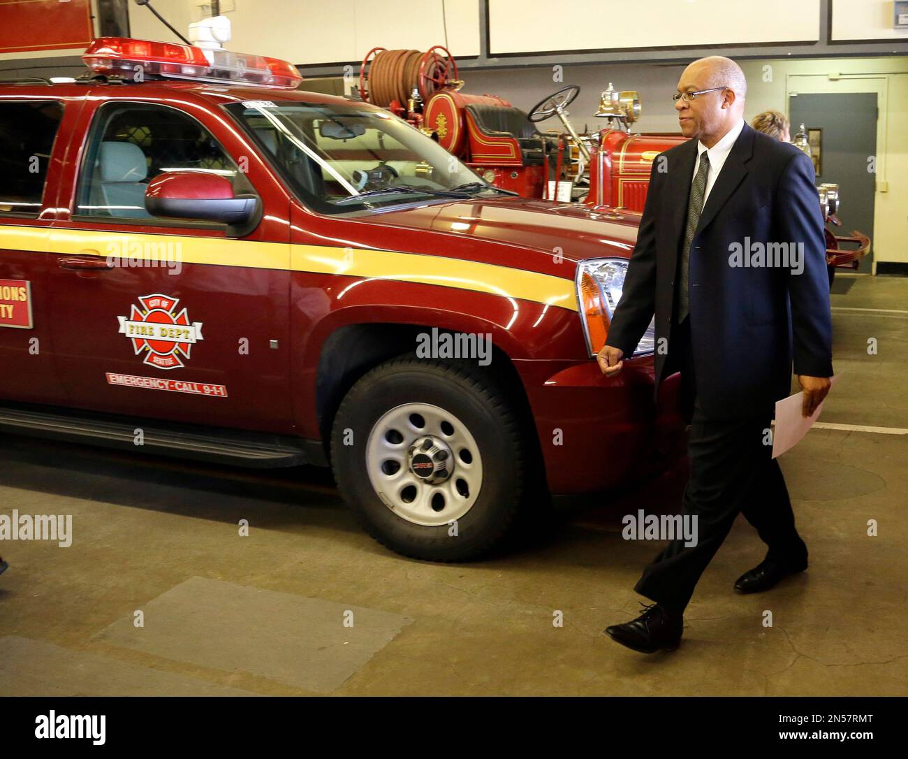 Seattle Fire Chief Gregory Dean arrives to talk to reporters Monday ...
