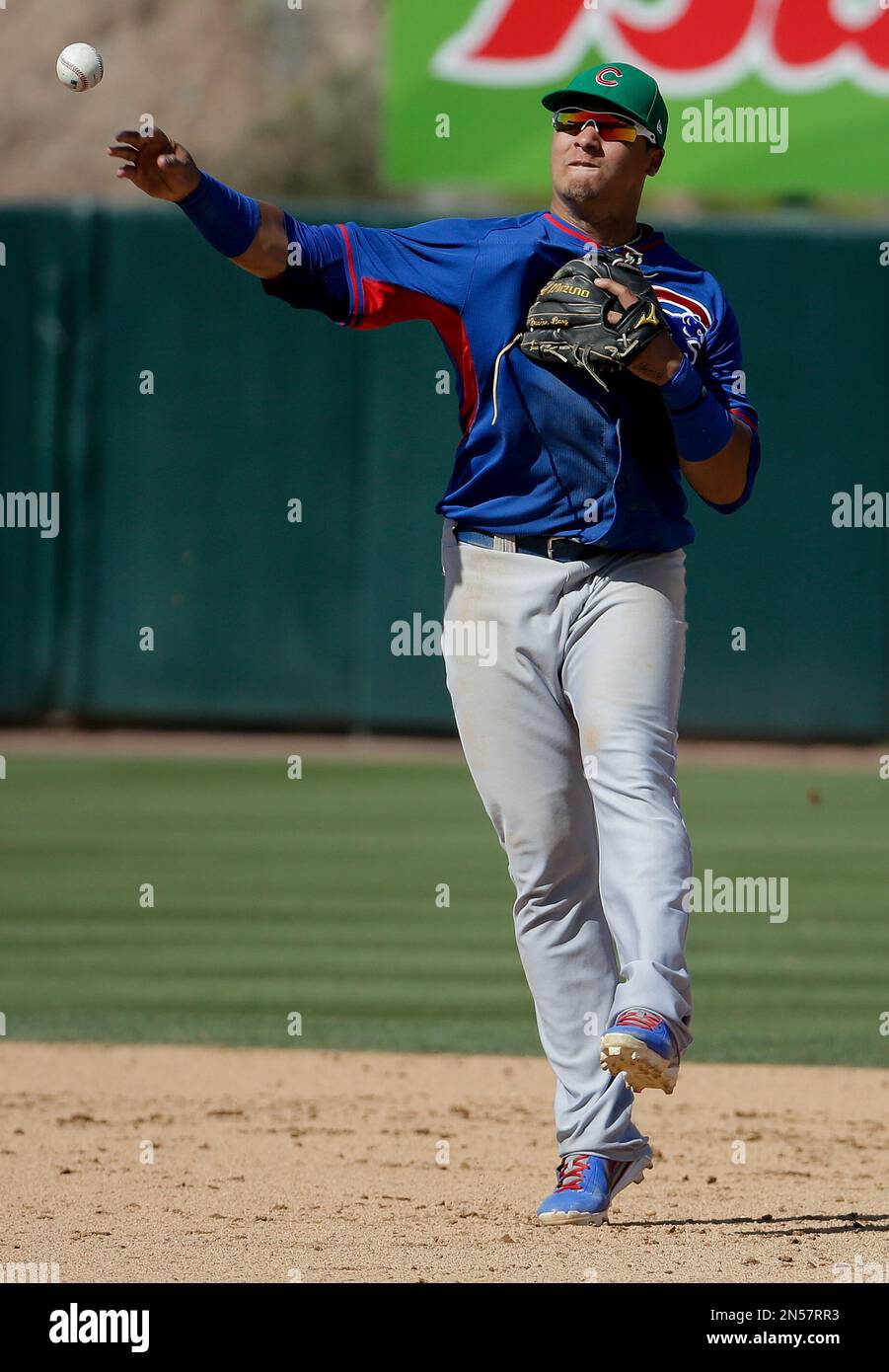 Chicago Cubs second baseman Javier Baez throws Oakland Athletics' Josh ...