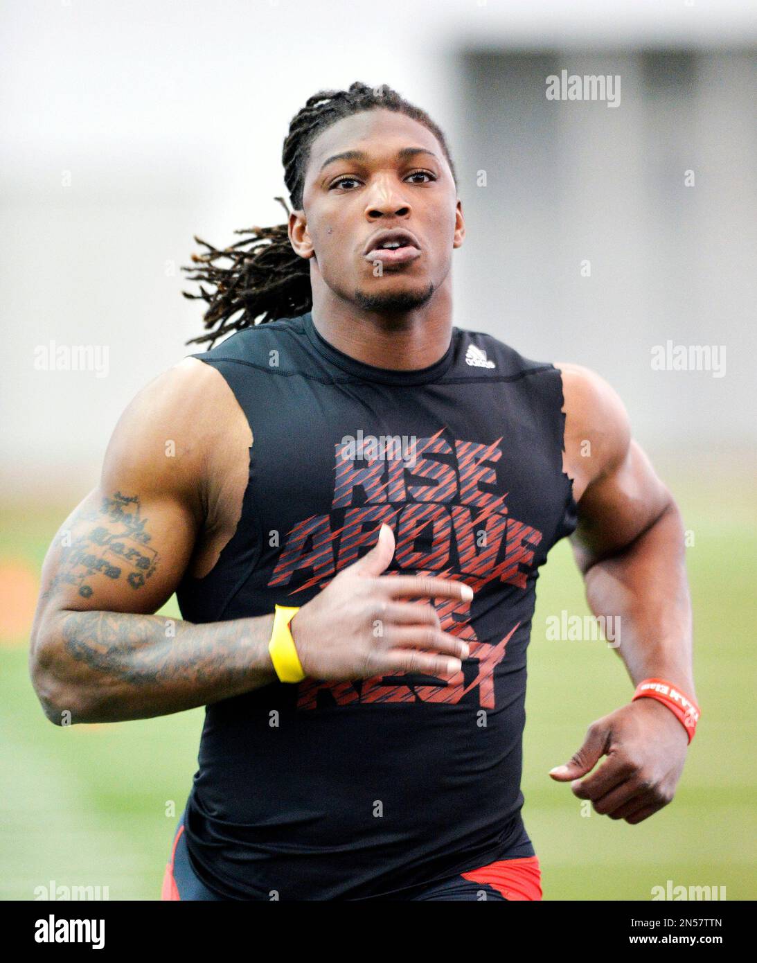 Louisville running back Senorise Perry participates in the 40-yard dash ...