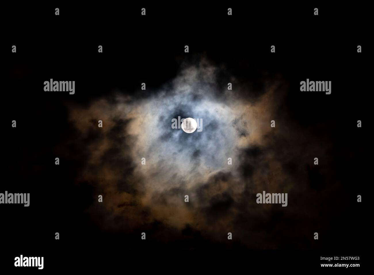 Bright full moon on cloudy hi-res stock photography and images - Alamy