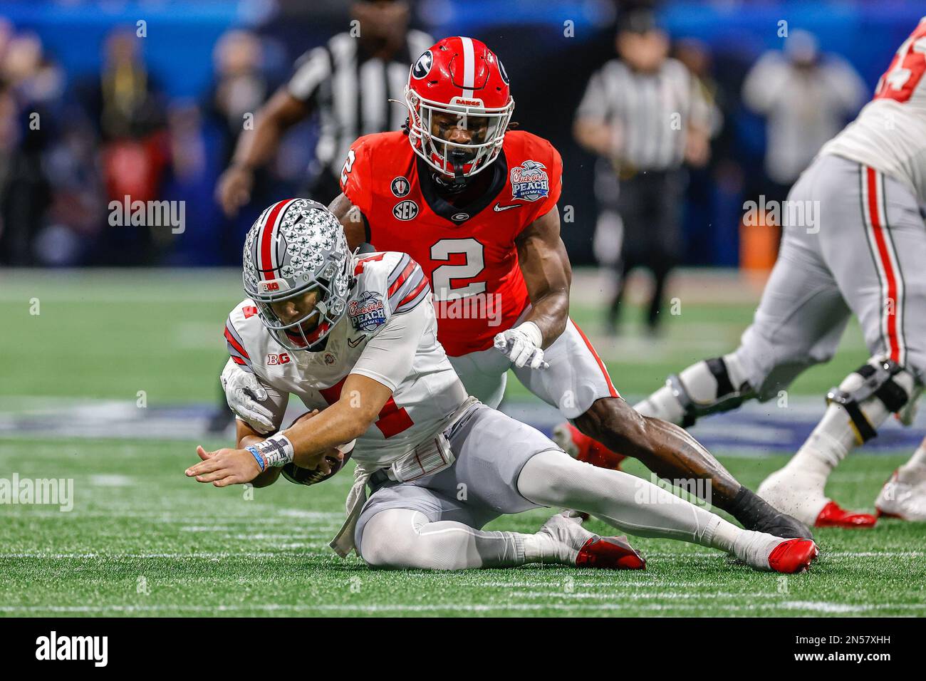 December 31, 2022: Georgia's Smael Mondon (2) takes down Ohio State's ...