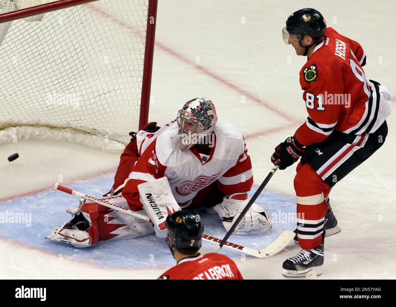 Chicago Blackhawks' Marian Hossa (81), right, scores against Detroit ...