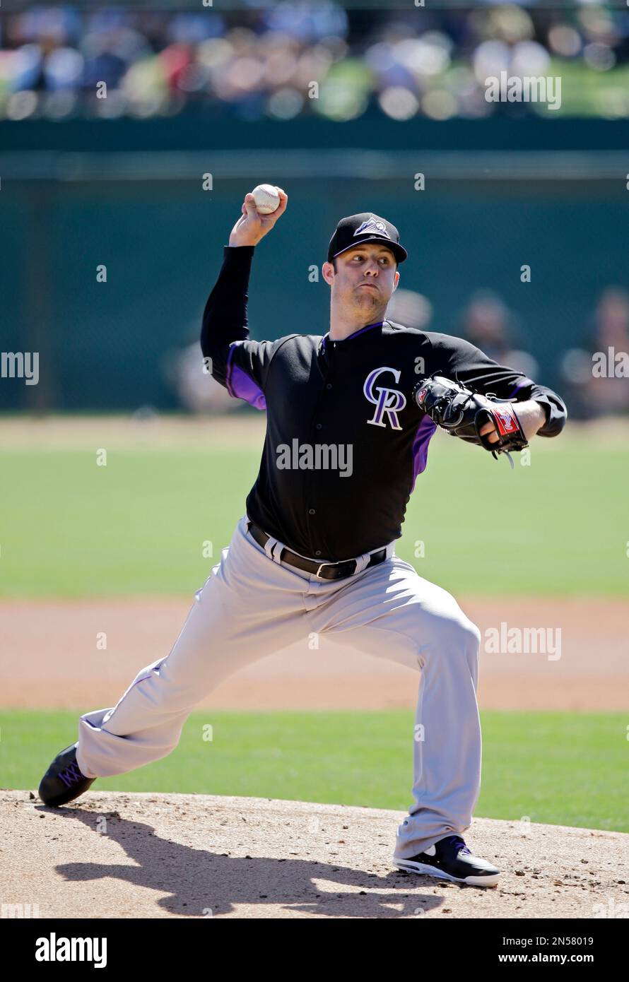 Colorado Rockies starting pitcher Jordan Lyles delivers against the Los ...